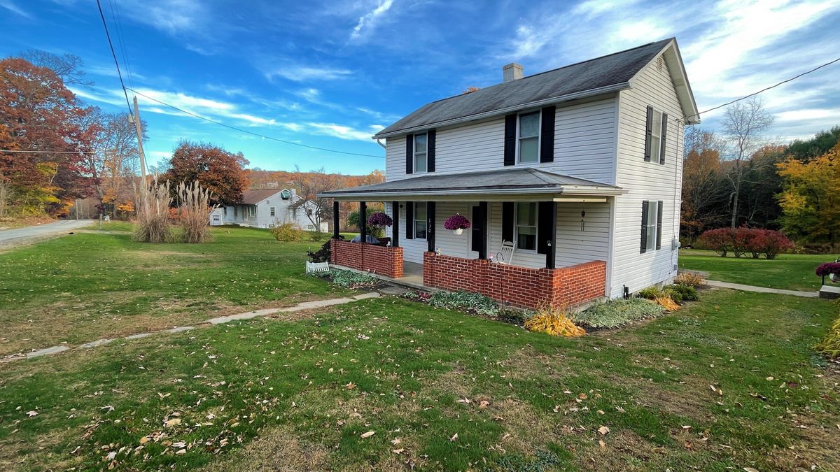 Country Home With Detached Garage On Acreage | Whitetail Properties