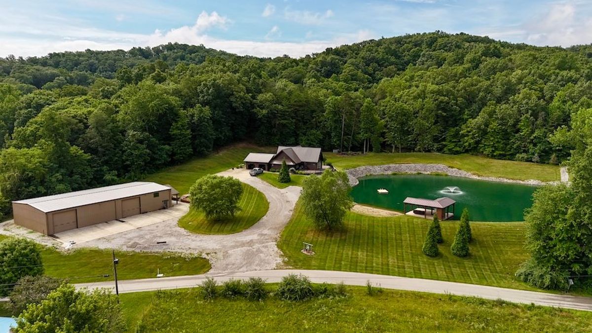 Timber-Framed Lodge Overlooking Private Pond In A Legendary Location ...