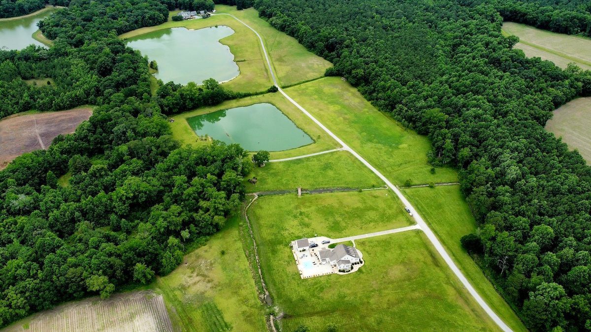 Buildable Home Site With Acreage And A Pond | Whitetail Properties