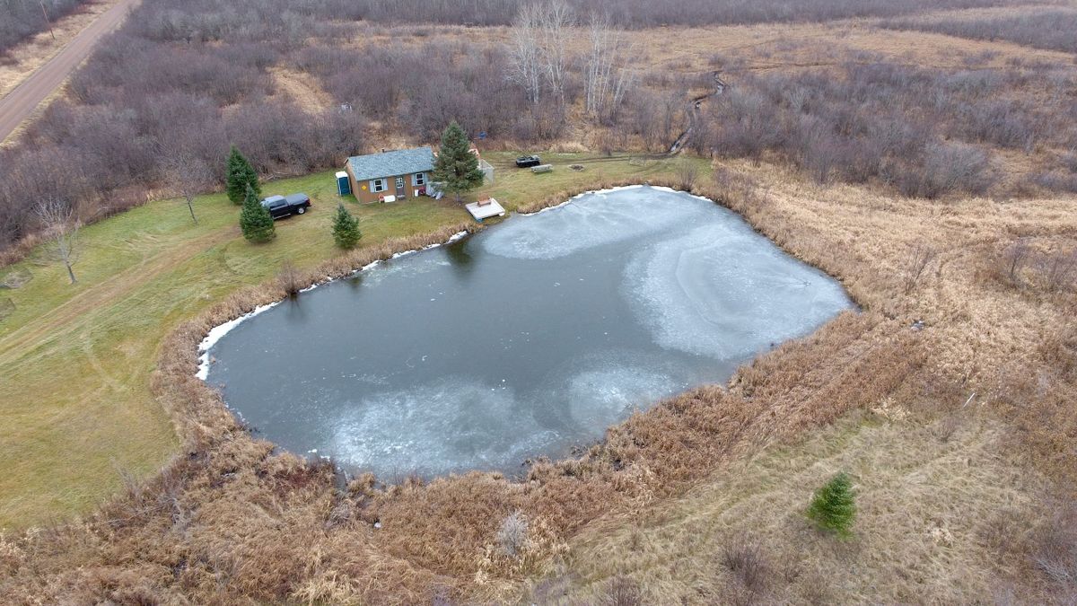 Cabin Overlooking Pond Close To National Forest | Whitetail Properties
