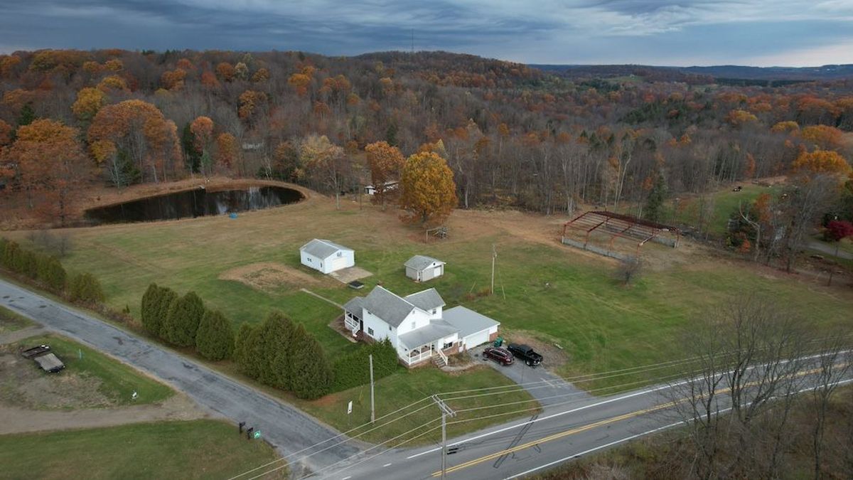 Country Home On Acreage With Pond And Outbuildings | Whitetail Properties